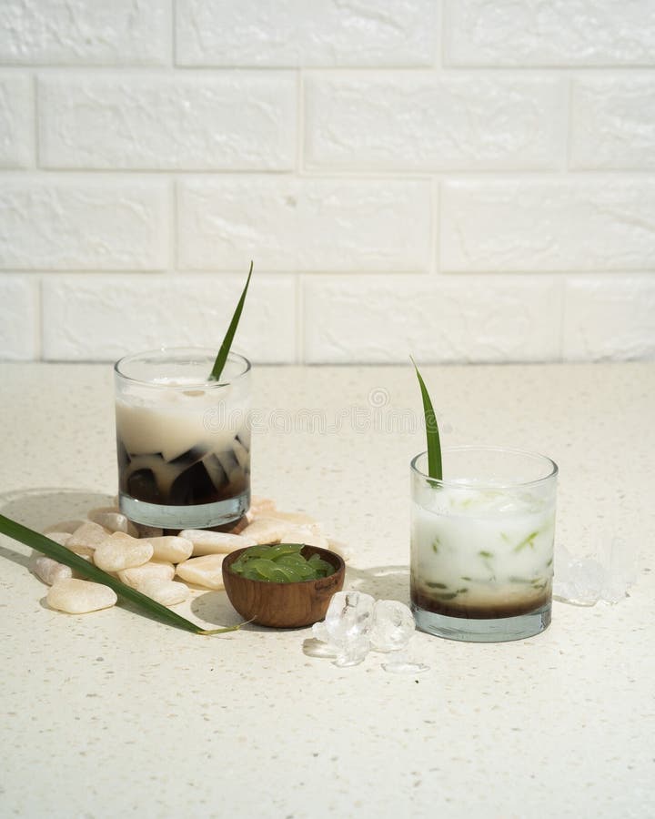 Refreshing Ice Tea Filled with Ice Cubes and Lemon Slices Isolated on ...