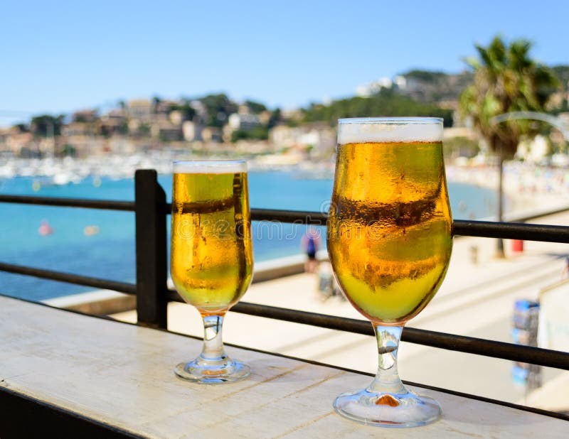His and Hers Ice Cold Beers on a Hot Summer Day with a View Stock Photo ...