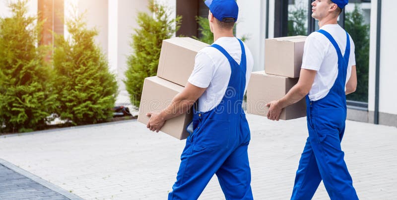 Two Removal Company Workers Have a Break while Sitting on the Step ...