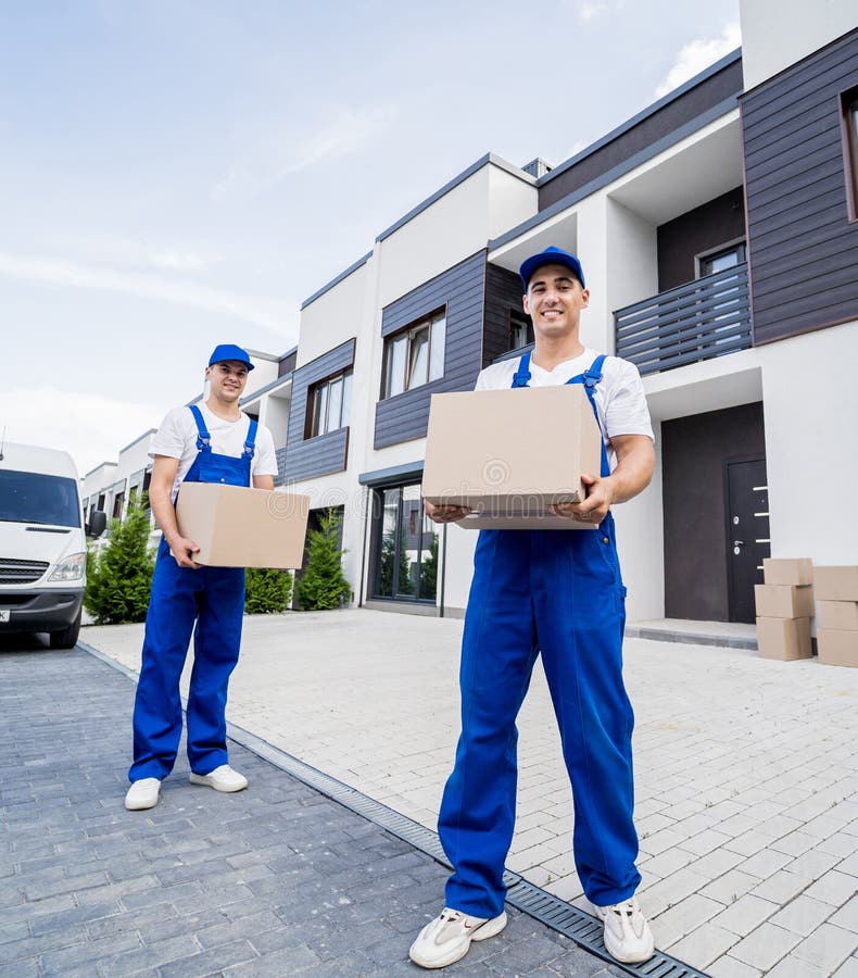 Two Removal Company Workers Unloading Boxes from Minibus into Customer ...