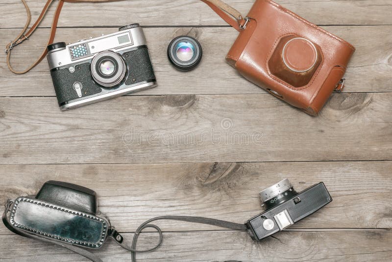 Two Retro Camera and Cover on Old Boards Stock Photo - Image of camera ...