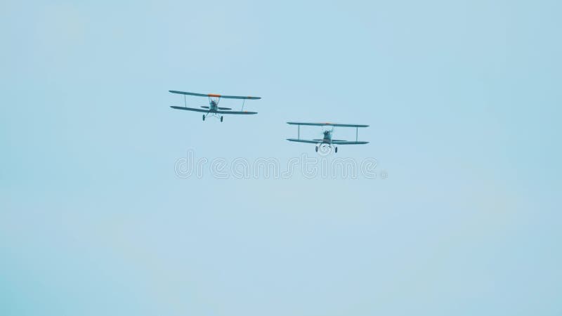 Two Old Biplane Planes Fly High in the Sky Together Stock Video - Video ...