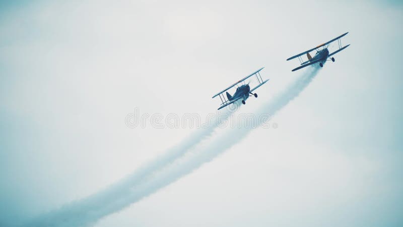 Two Retro Planes Fly High in the Sky Togther. Teamwork or Double Effort ...