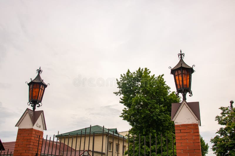 Two Retro Style Lanterns on the Gate Stock Image - Image of city ...