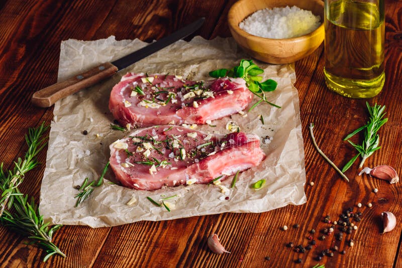 Two Rib-Eye Steaks Prepared for Roasting Stock Image - Image of garlic ...