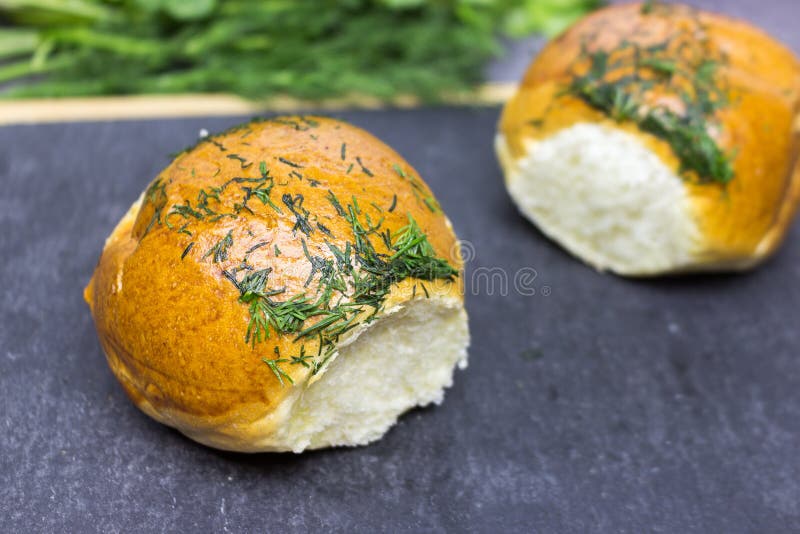 Two Rich, Fluffy Fresh Buns with Garlic and Dillon a Black Kitchen ...