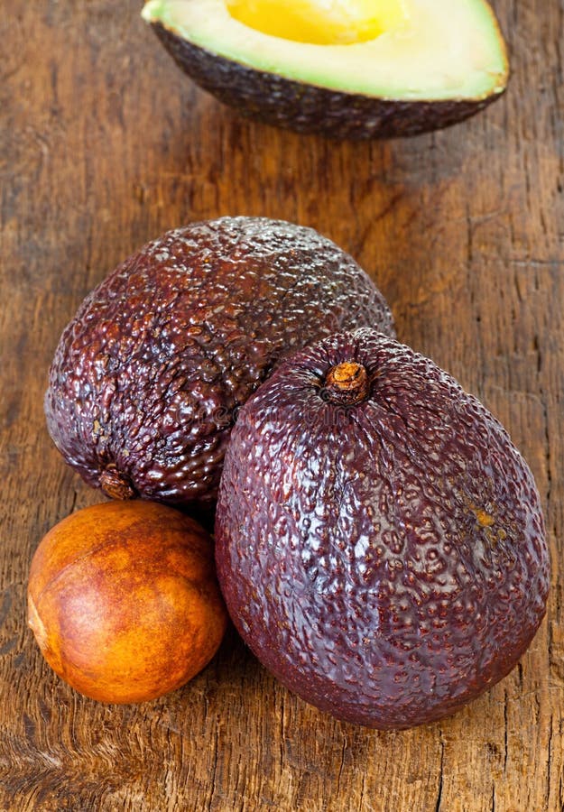 Two Ripe Avocados and Avocado Core Stock Photo - Image of organic ...
