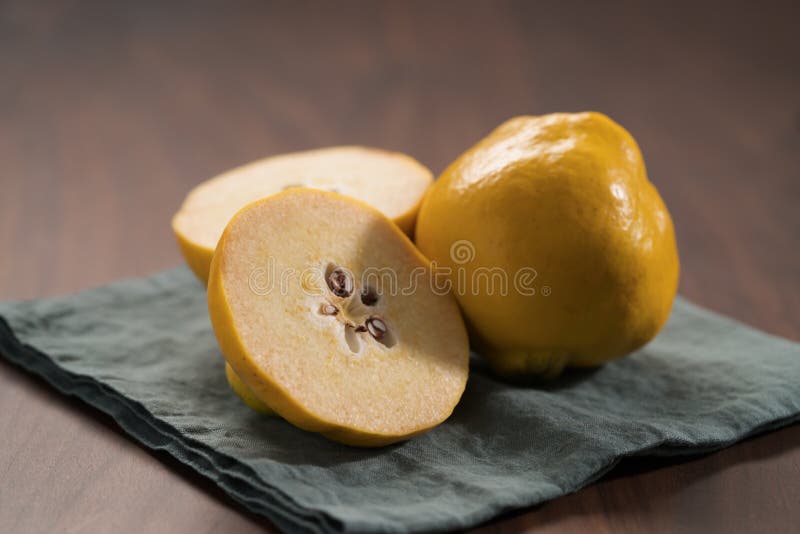 Two Ripe Quince Fruit on Wood Table Stock Photo - Image of organic ...