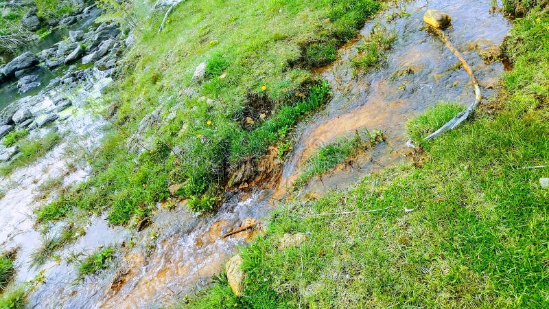 Two Rivers from two worlds stock image. Image of rock - 179885731