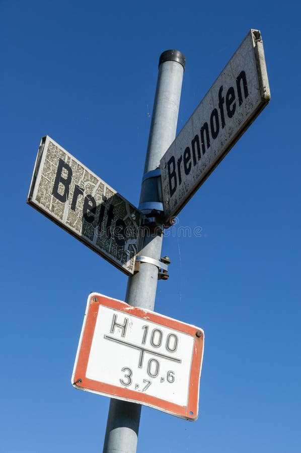 Two Road Signs and a Fire Hydrant Sign on a Pole Stock Image - Image of ...