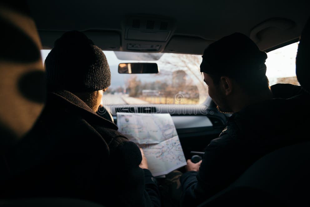 Two Robbers Looking at a Map and Planning Their Next Robbers Stock ...
