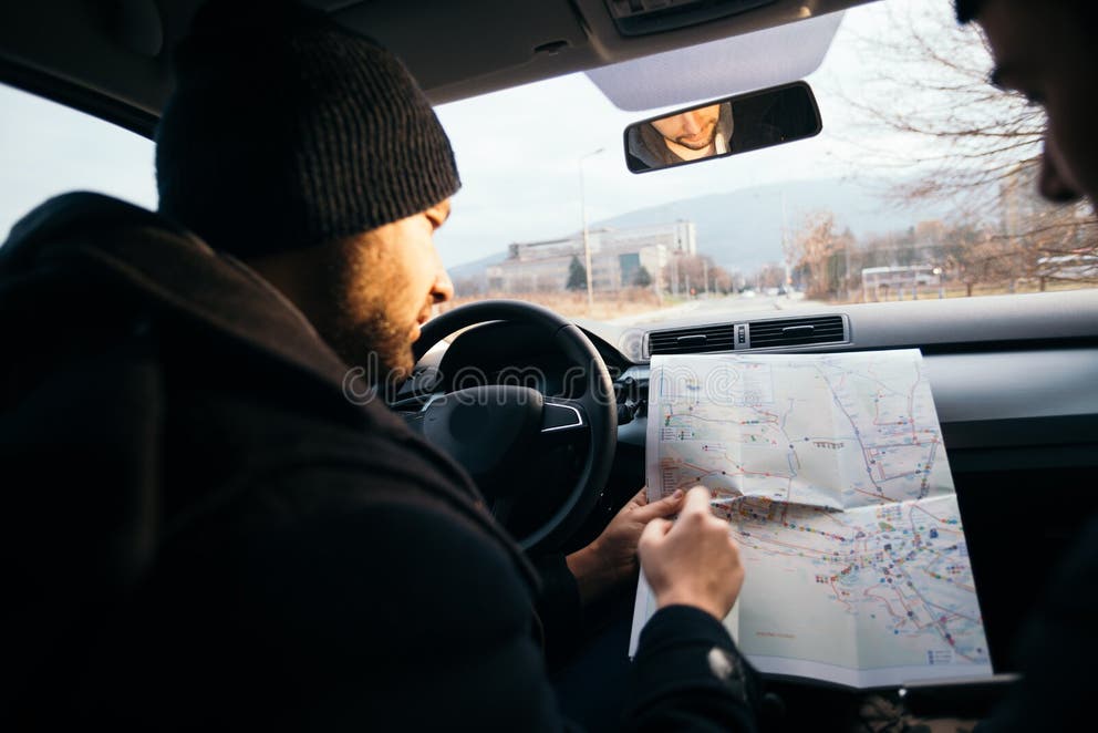 Two Robbers Looking at a Map and Planning Their Next Robbers Stock ...