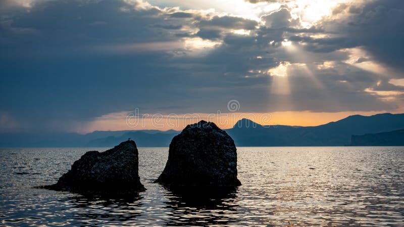 Two Rocks in Sea Under Sunset Sky Stock Image - Image of calmness ...