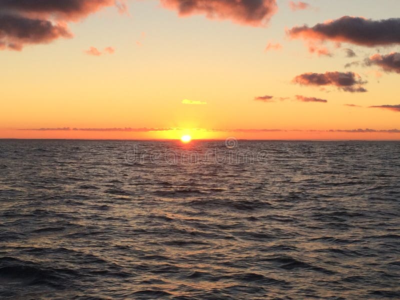 Two rocks stock image. Image of rocks, ocean, sunrise - 149835787