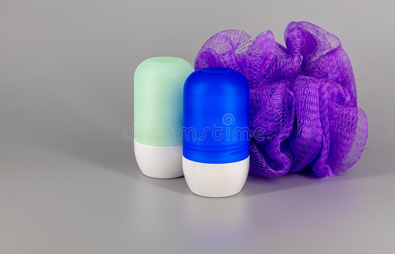 Two Roll-on Deodorants with a Scrub Nylon Sponge - Bath Products Stock ...