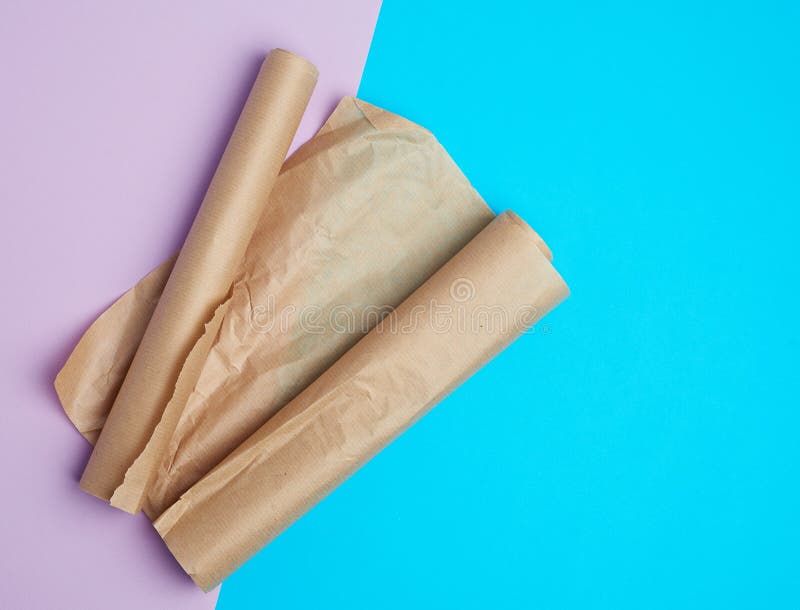 Two Rolls Of Parchment Paper On A Blue Background Stock Photo - Image ...