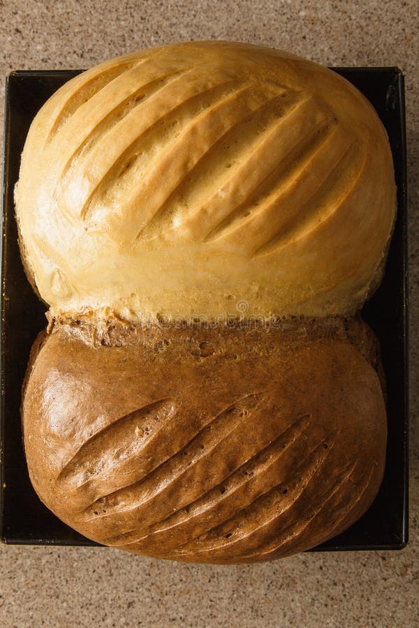 Two Rolls of Baked Home-made Bread Lie on the Ditch Stock Image - Image ...