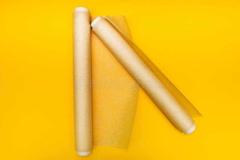 Two Rolls of Parchment Paper on a Blue Background Stock Photo - Image ...