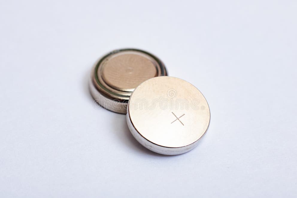 Two Round Batteries on a White Background Stock Image - Image of store ...