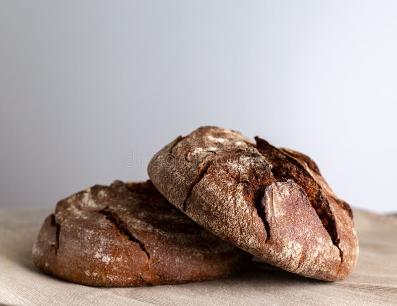Two Round Loaves of Rye Bread on the Table Stock Image - Image of ...