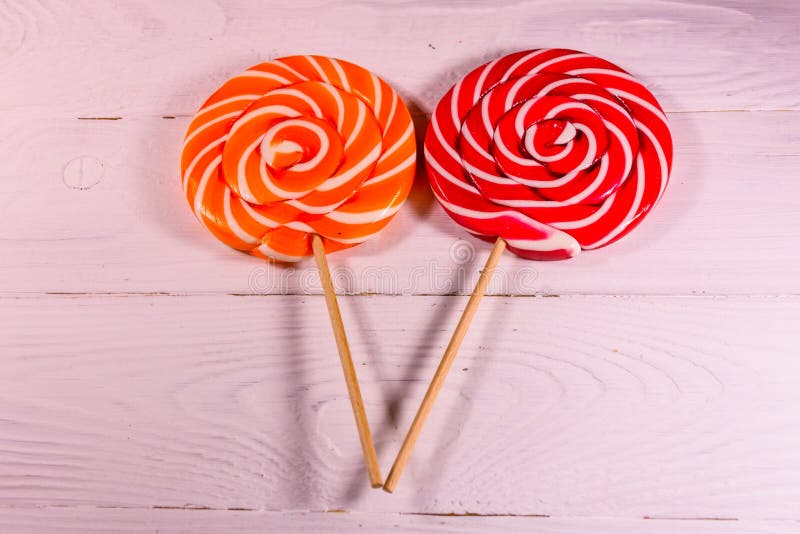 Two Round Lollipops on a Wooden Table. Top View Stock Photo - Image of ...