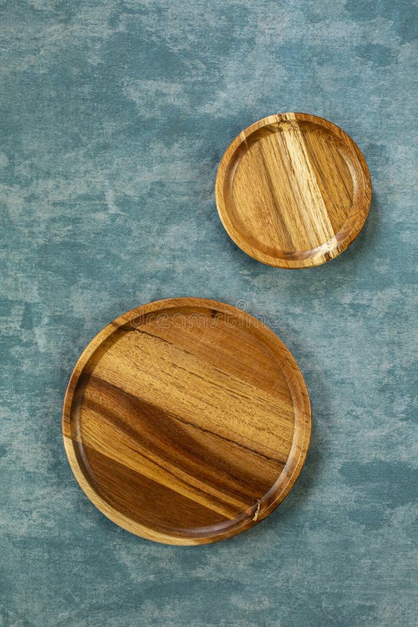 Round Wooden Tray on Blue Textured Background – Top View Stock Image ...