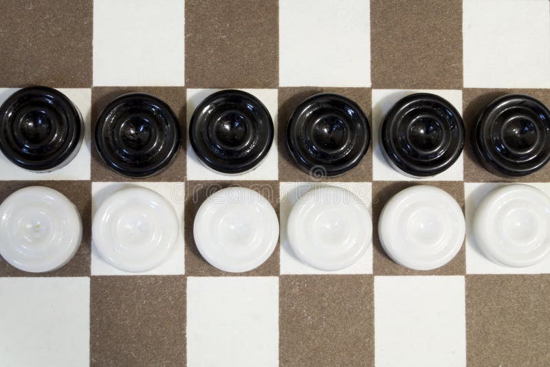 Two Rows of Checkers White and Black on the Chessboard Stock Photo ...