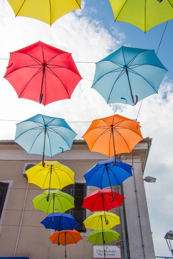 Two Rows of Colourful Umbrellas on the Sky Stock Photo - Image of ...