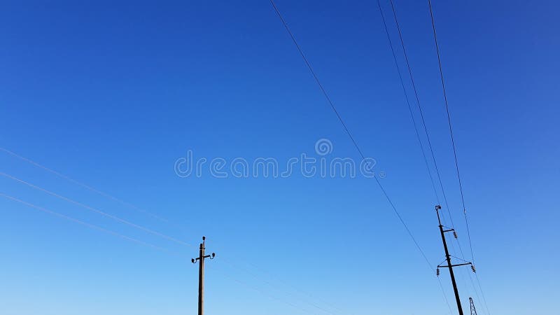 Two Rows of Power Lines in Blue Sky Background Stock Footage - Video of ...