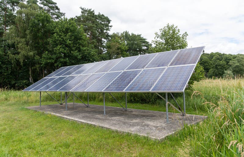 Two Rows of Solar Panels on a Farm Stock Photo - Image of energy, green ...