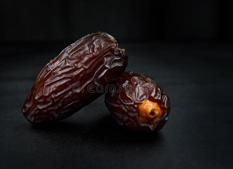 Two Royal Dates on Black Background Stock Photo - Image of healthy ...