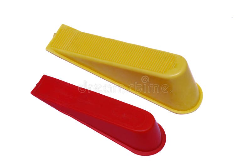 Two rubber door wedges stock image. Image of rubber, doorstop - 90588677