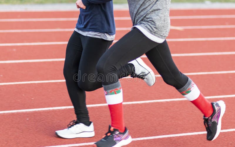 Two Runners Training on a Track Stock Photo - Image of holiday, field ...