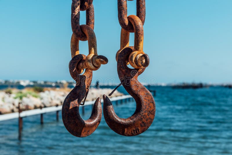 Two Rusty Iron Hooks on the Chains Stock Image - Image of corroded ...