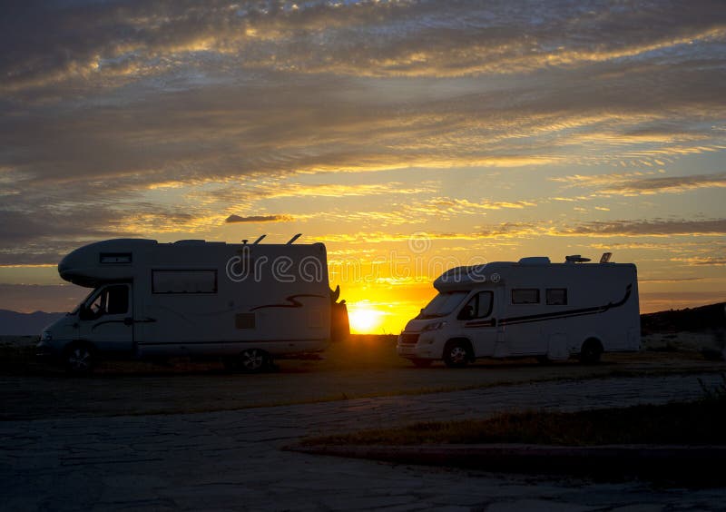 RV Campers On The Beach At Sunset Stock Photo - Image of light, motor ...