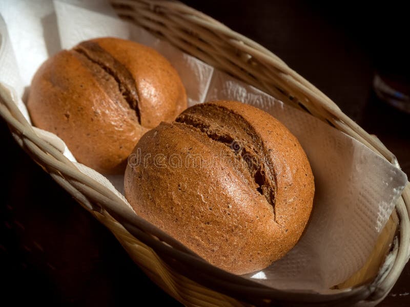 Two Rye Round Buns on a Napkin in a Straw Basket Stock Image - Image of ...