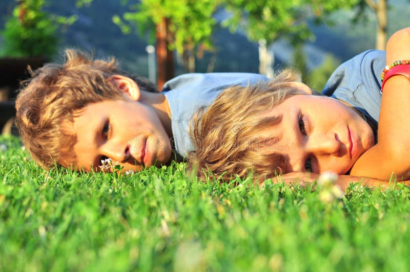 Two sad boys stock photo. Image of children, boys, looking - 59076708