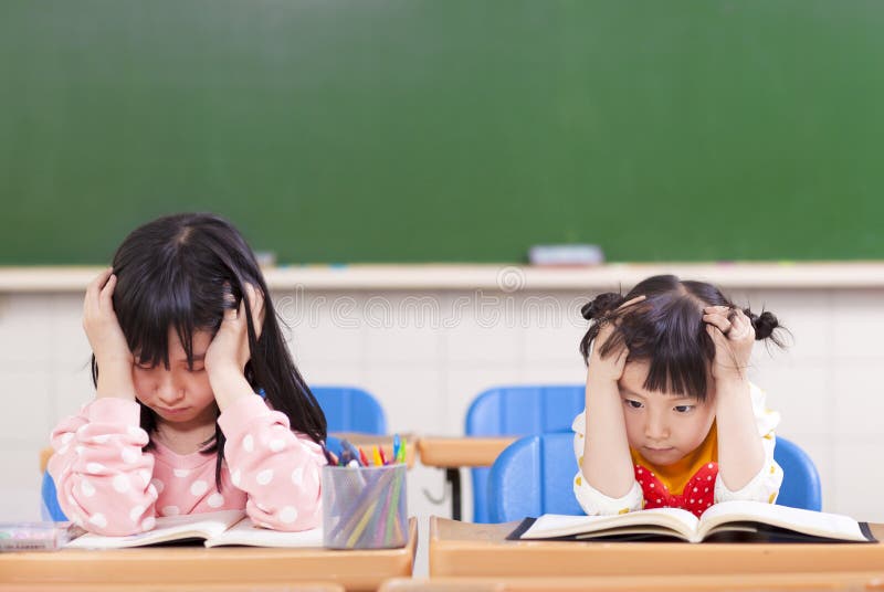 Two Sad Girls Doing in Homework Stock Photo - Image of achieve, asian ...