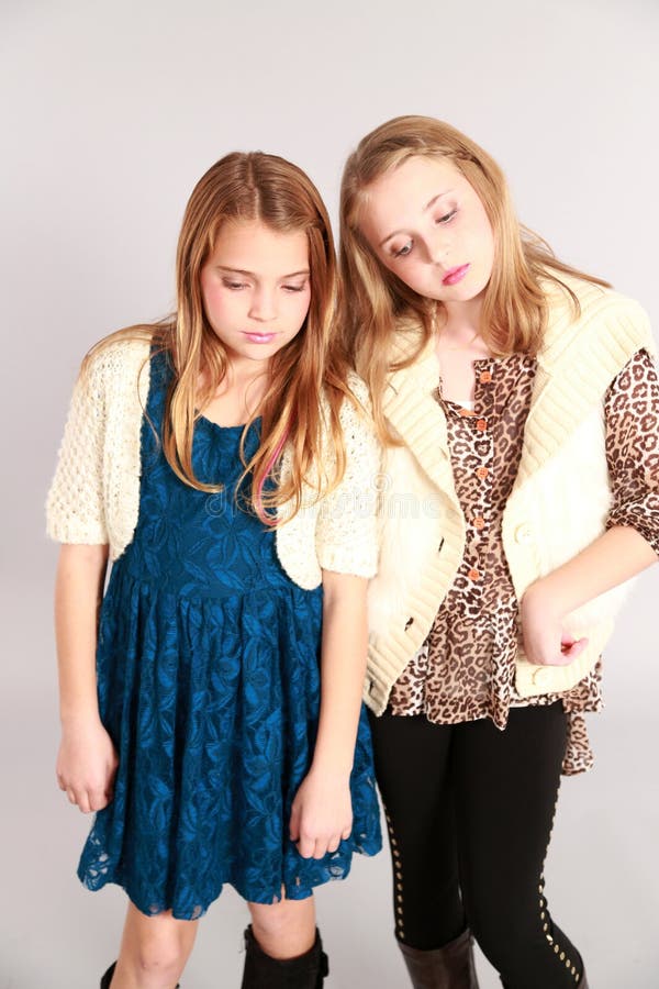 Two sad young girls stock photo. Image of person, average - 35904100