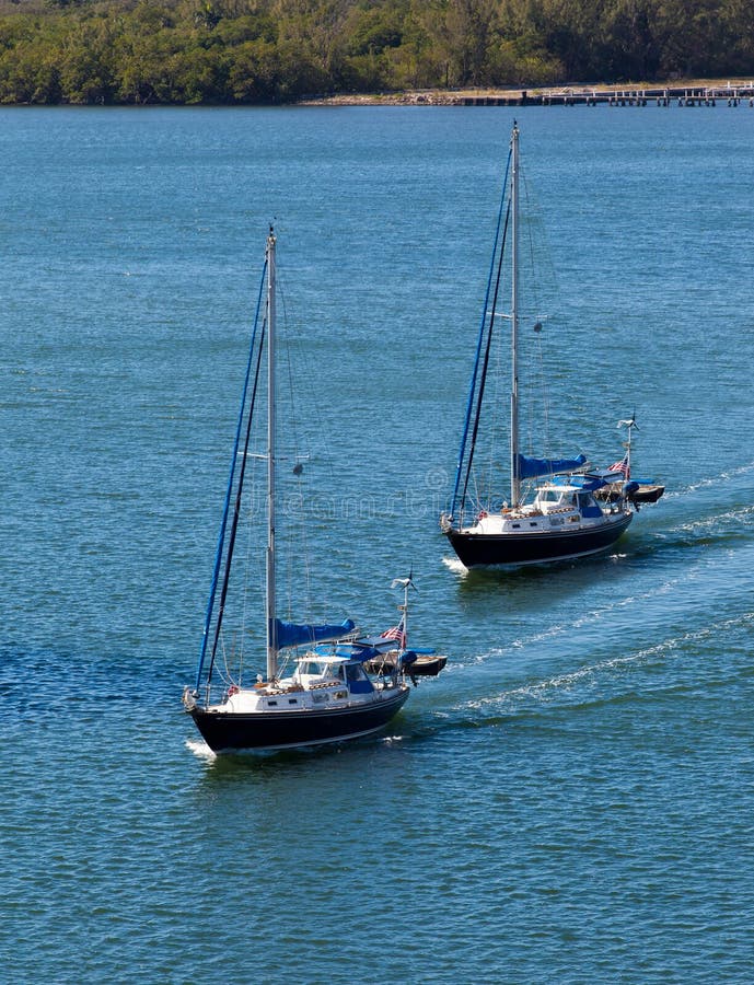Two sail boats navigating stock photo. Image of active - 63487222 Two sail boats navigating stock photo. Image of active - 63487222