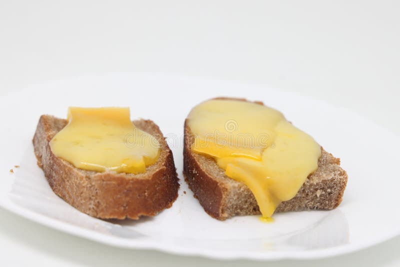 Two Sandwiches with Cheese and Rye Bread for Breakfast, Warmed Up in ...