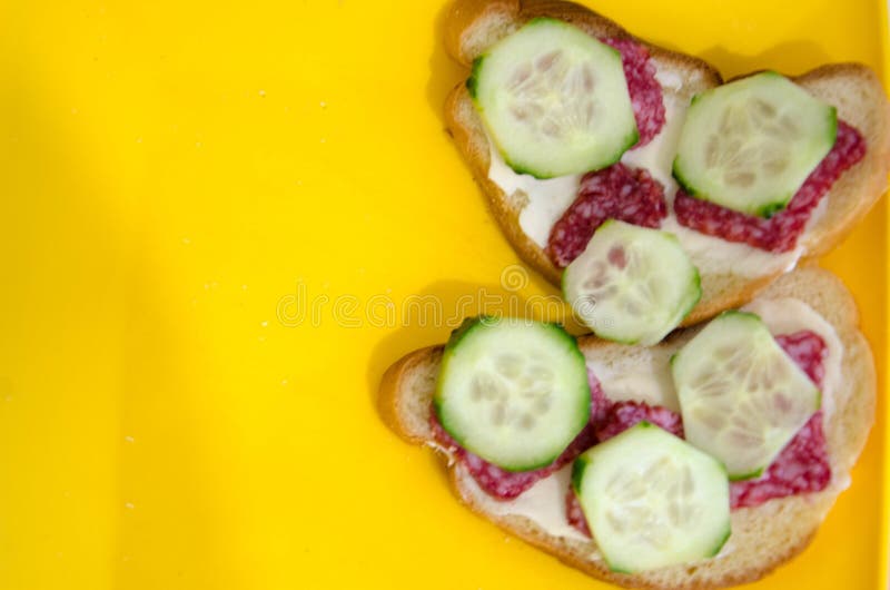 Two Sandwiches on a Yellow Plate. Stock Photo - Image of meat ...