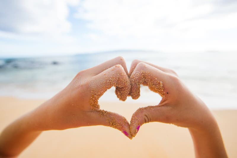 Hands Forming the Shape of a Heart Stock Photo - Image of sandy, people ...