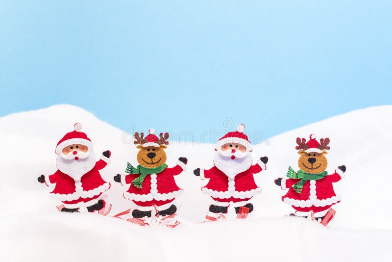 Two Santa Clauses and Two Reindeers Stock Image - Image of backgrounds ...