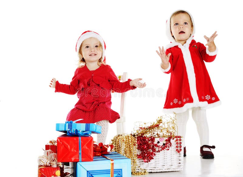 Two santa helpers stock image. Image of people, holiday - 35155121