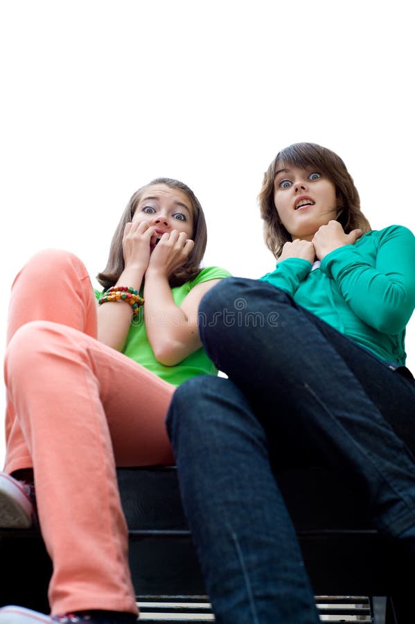 Two scared beautiful girls stock image. Image of blue - 11821599