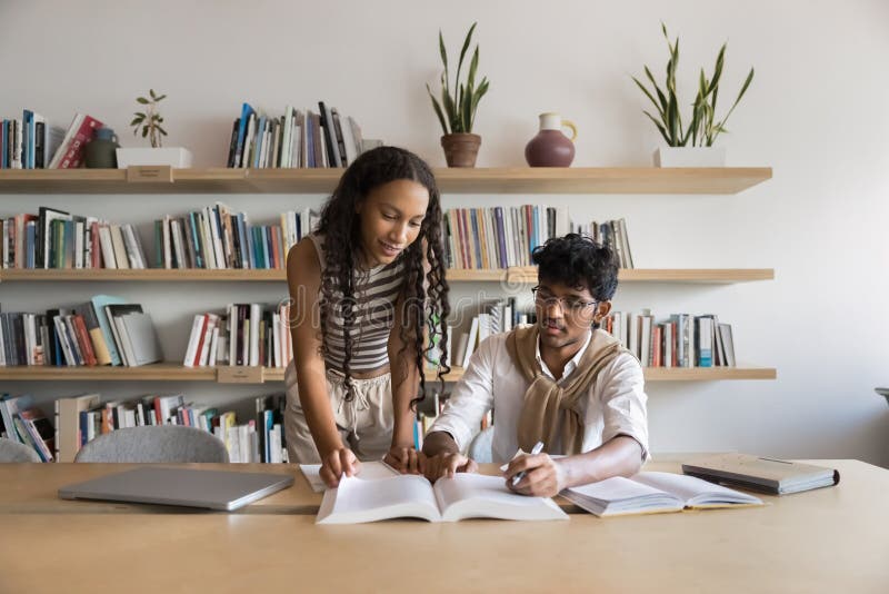 Two Schoolmates or Students Doing University Assignment Stock Image ...