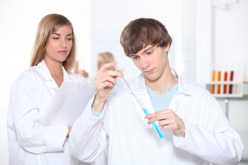 Science Students in Laboratory Stock Photo - Image of laboratory, rack ...