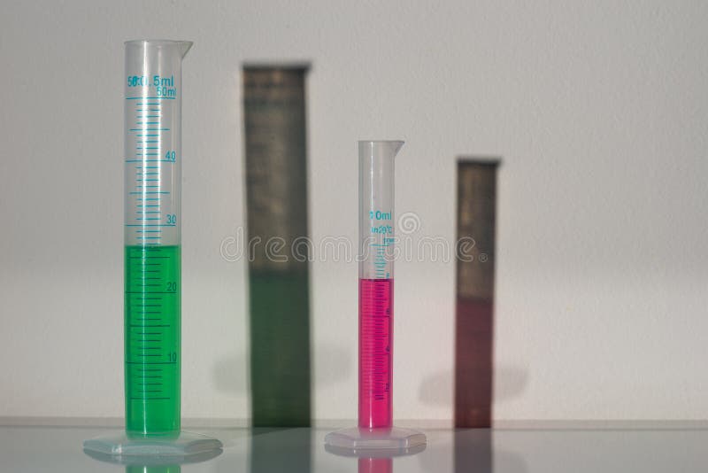 Two Scientific and Medical Laboratory Test Tubes with Red and Green ...