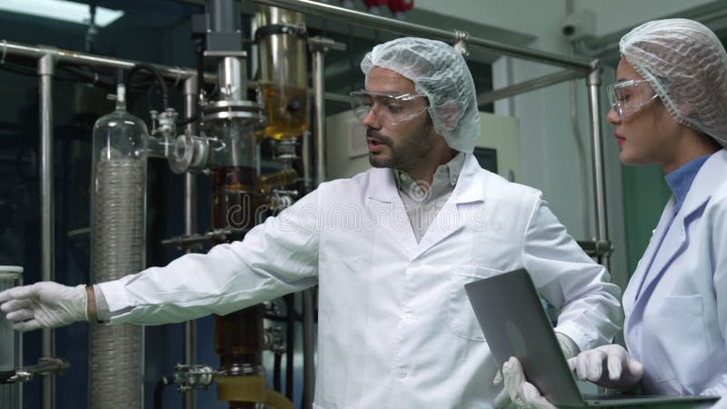 Two Scientist in Professional Uniform Working in Curative Laboratory ...